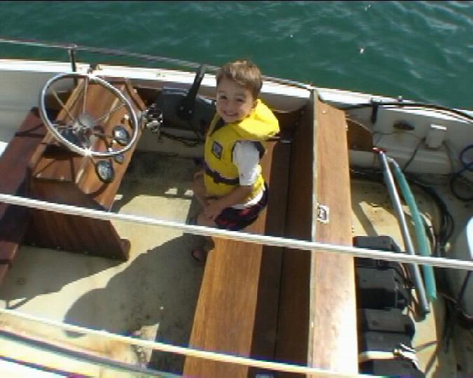 kids at play: pj getting ready to drive the whaler